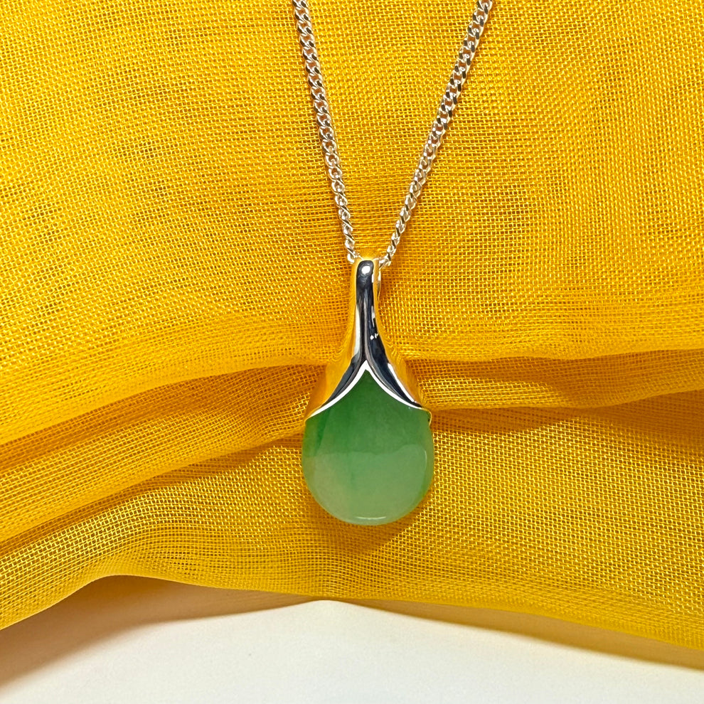 Real green jade necklace in a teardrop or pear shape, a really meaning ...