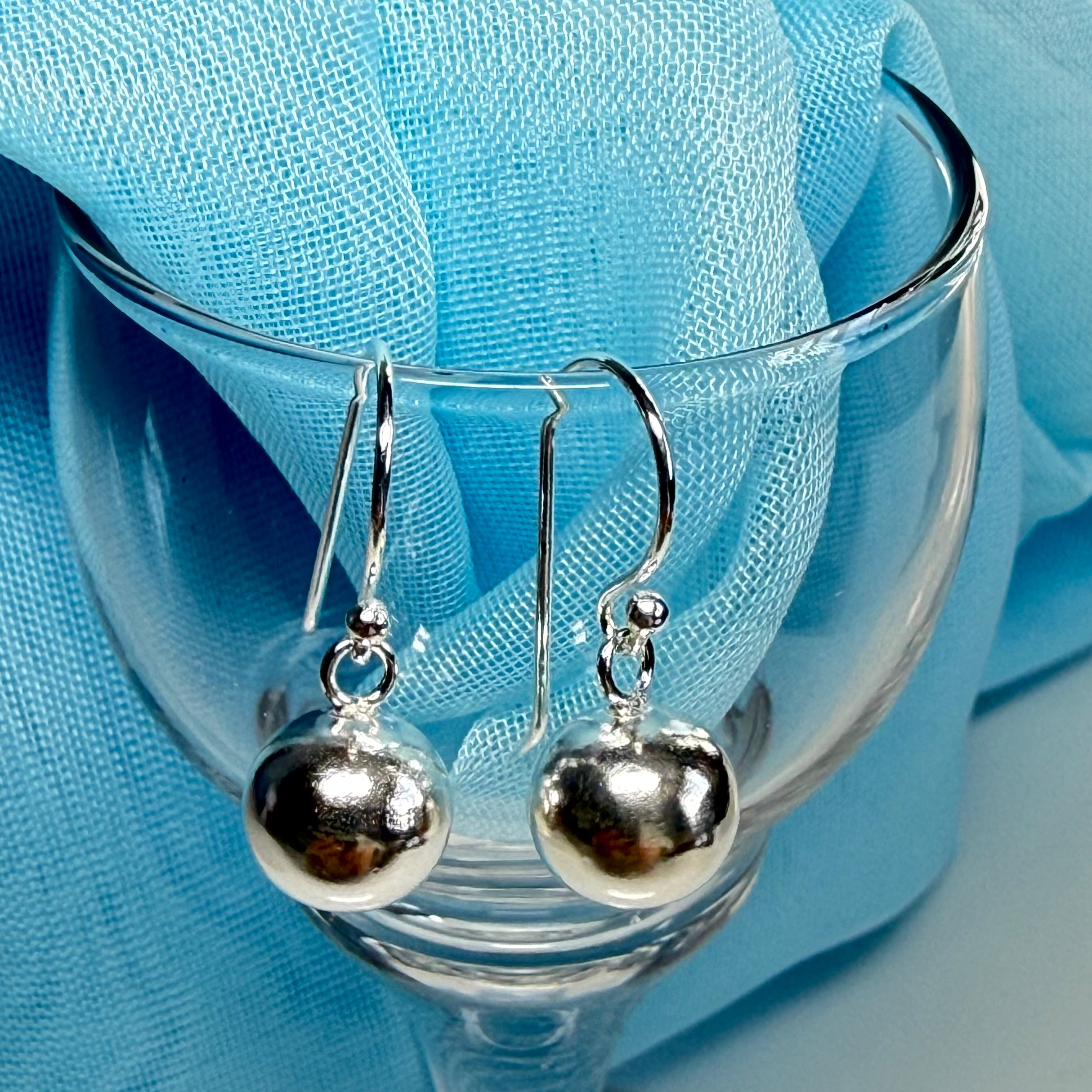 Sterling silver ball shaped drop earrings – Sarah Beth Jewellers